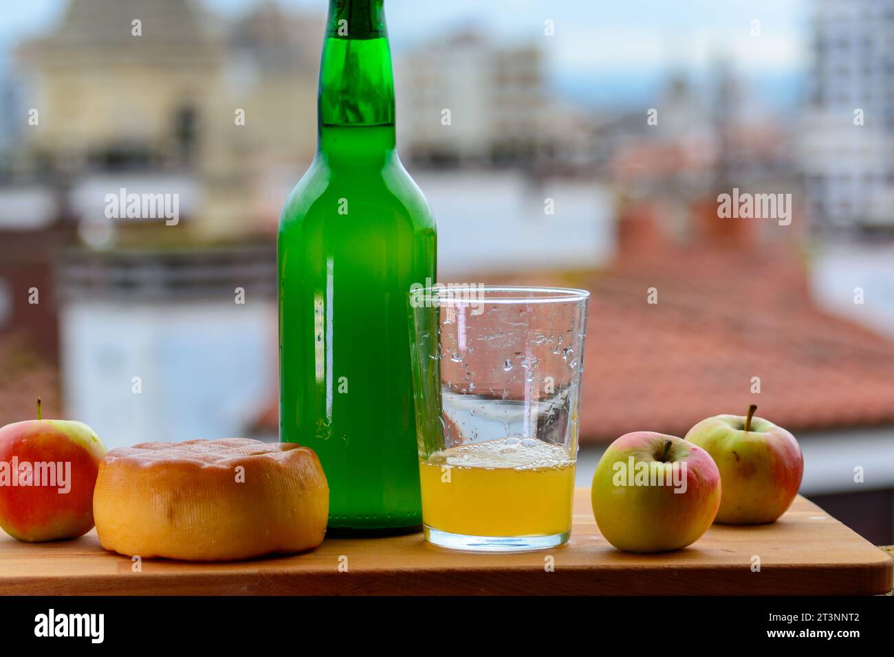 Traditional natural Asturian cider made from fermented apples in wooden ...