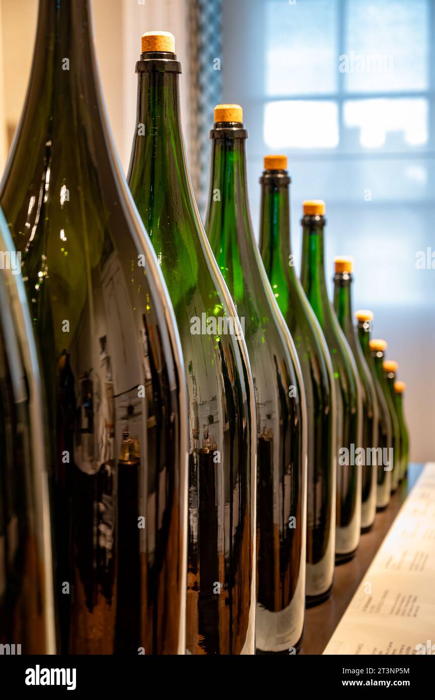 Different sizes of champagne bottles, traditional making champagne ...