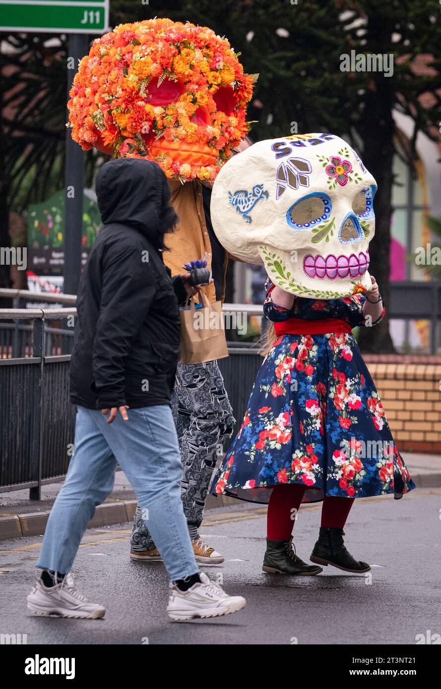 Skeleton heads are carried through Leeds city centre during a photocall ...
