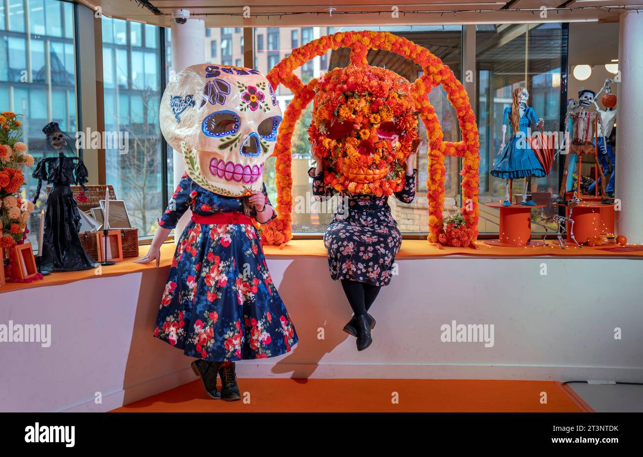 People wear skeleton heads at Leeds Playhouse, that form part of the ...
