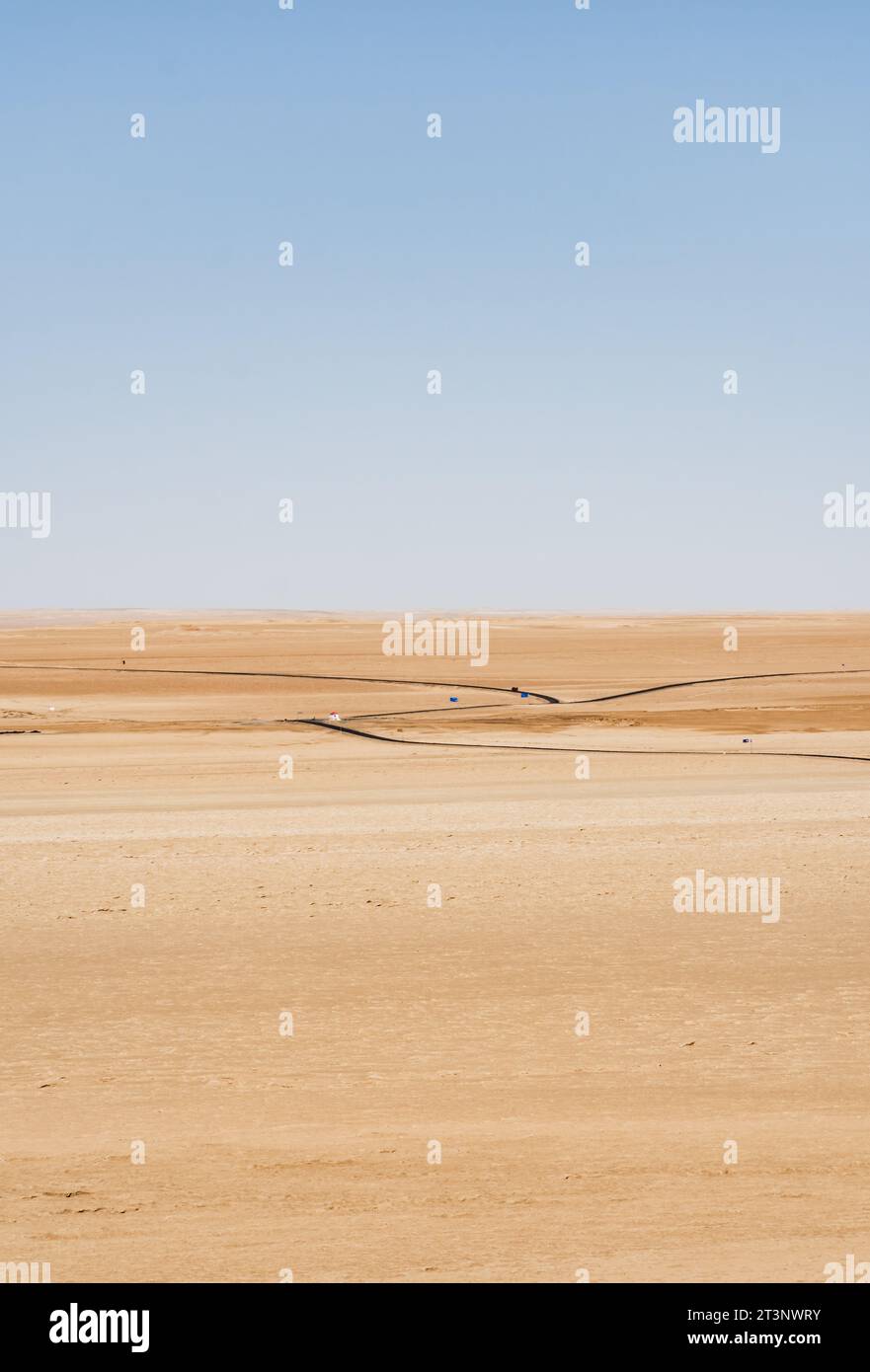 Tar Road in the Desert Stock Photo - Alamy