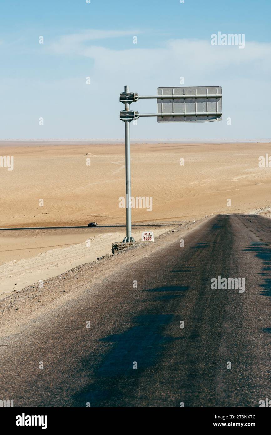 Tar Road in the Desert of Western China Stock Photo - Alamy