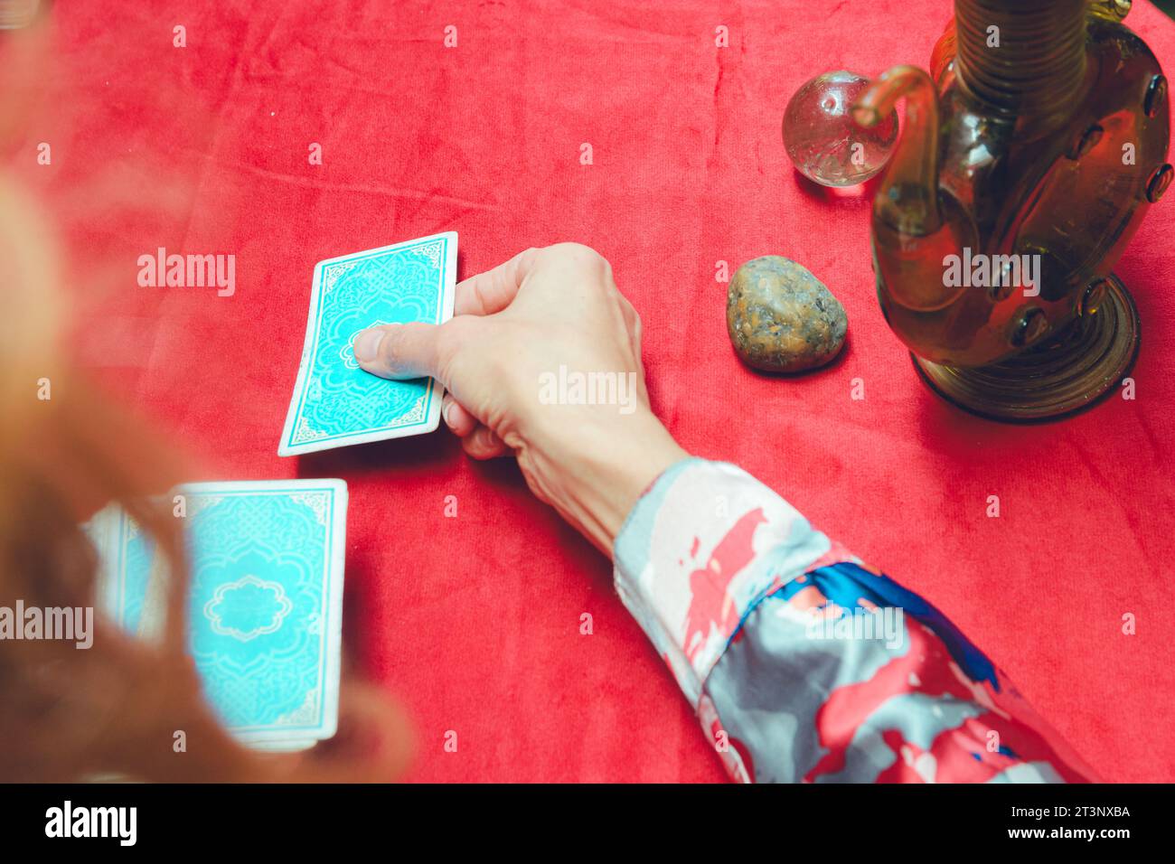 first person top view of unrecognizable caucasian woman placing blue ...