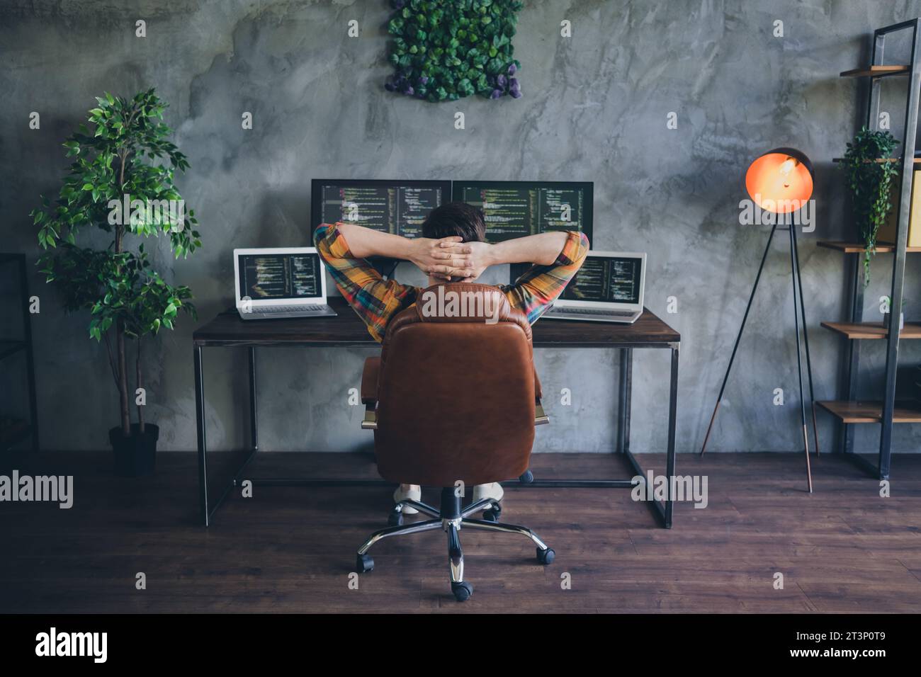 Full size rear behind photo of peaceful person sit chair hands behind ...