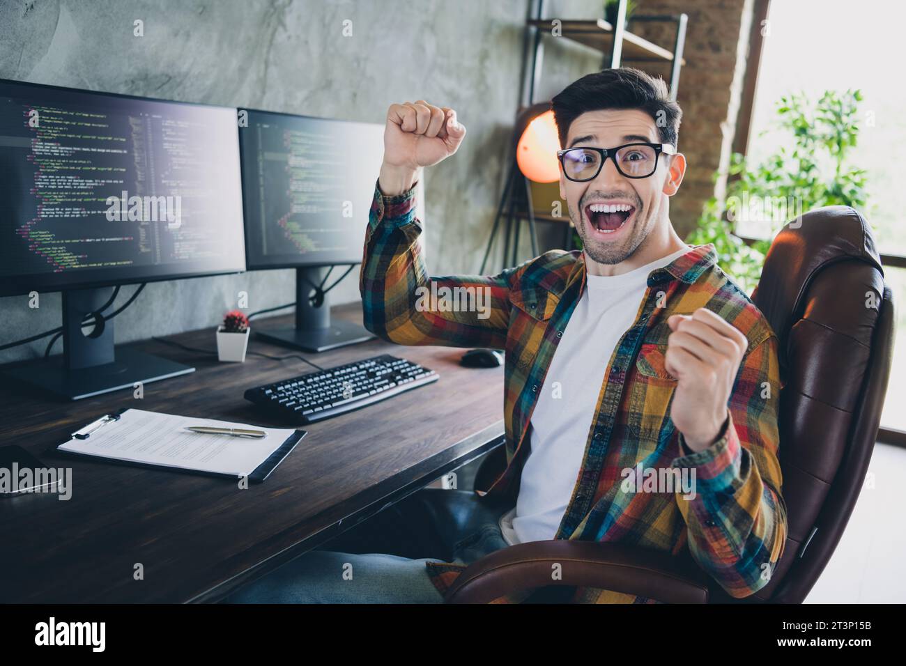 Side profile photo of young funny lucky businessman raised fists up ...