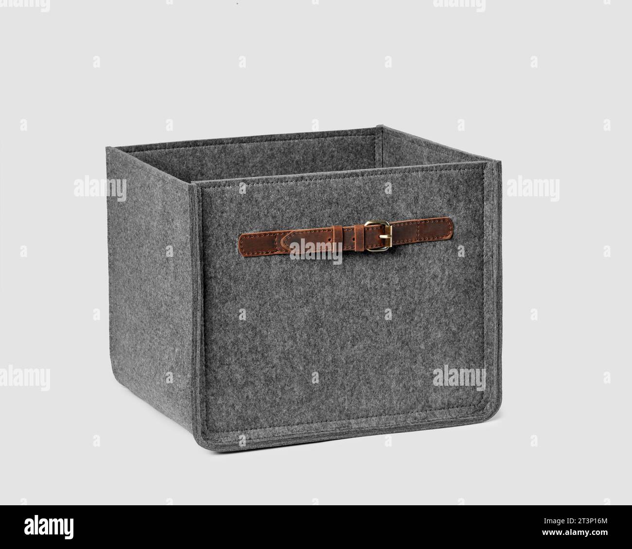 Functional storage box of natural gray felt with leather handles Stock ...
