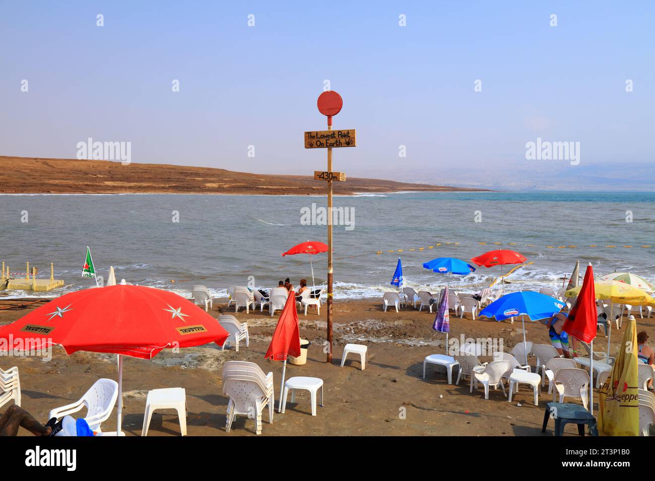 DEAD SEA, ISRAEL - OCTOBER 30, 2022: Tourists visit Dead Sea beach in ...