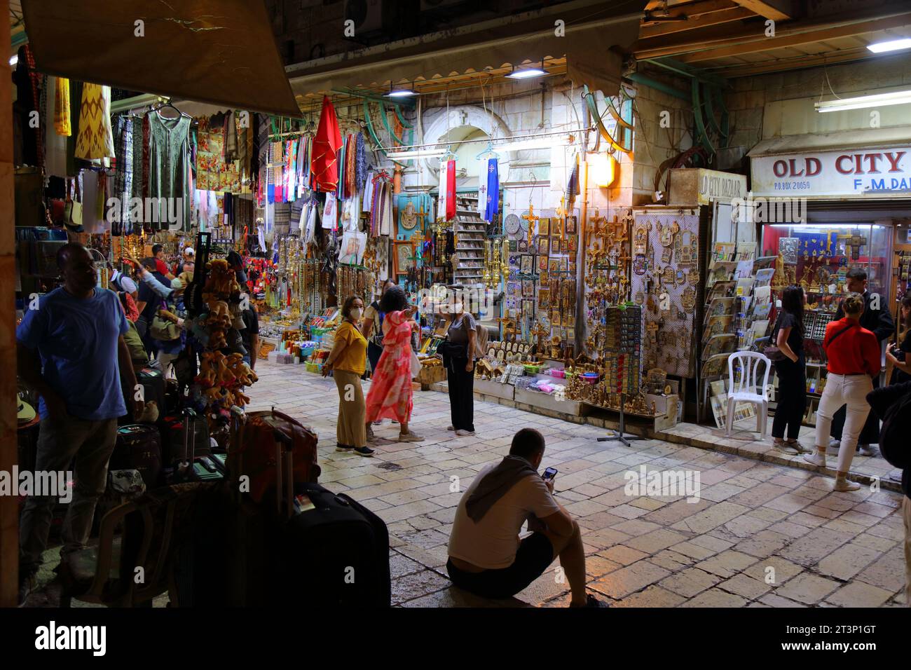 JERUSALEM, ISRAEL - OCTOBER 29, 2022: Tourists visit one of many souks ...
