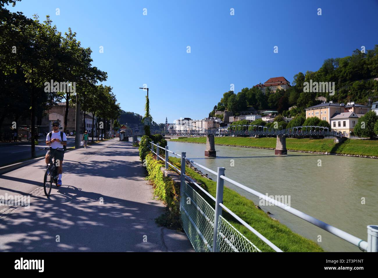 SALZBURG, AUSTRIA - AUGUST 4, 2023: Cyclists ride the Tauern Radweg ...