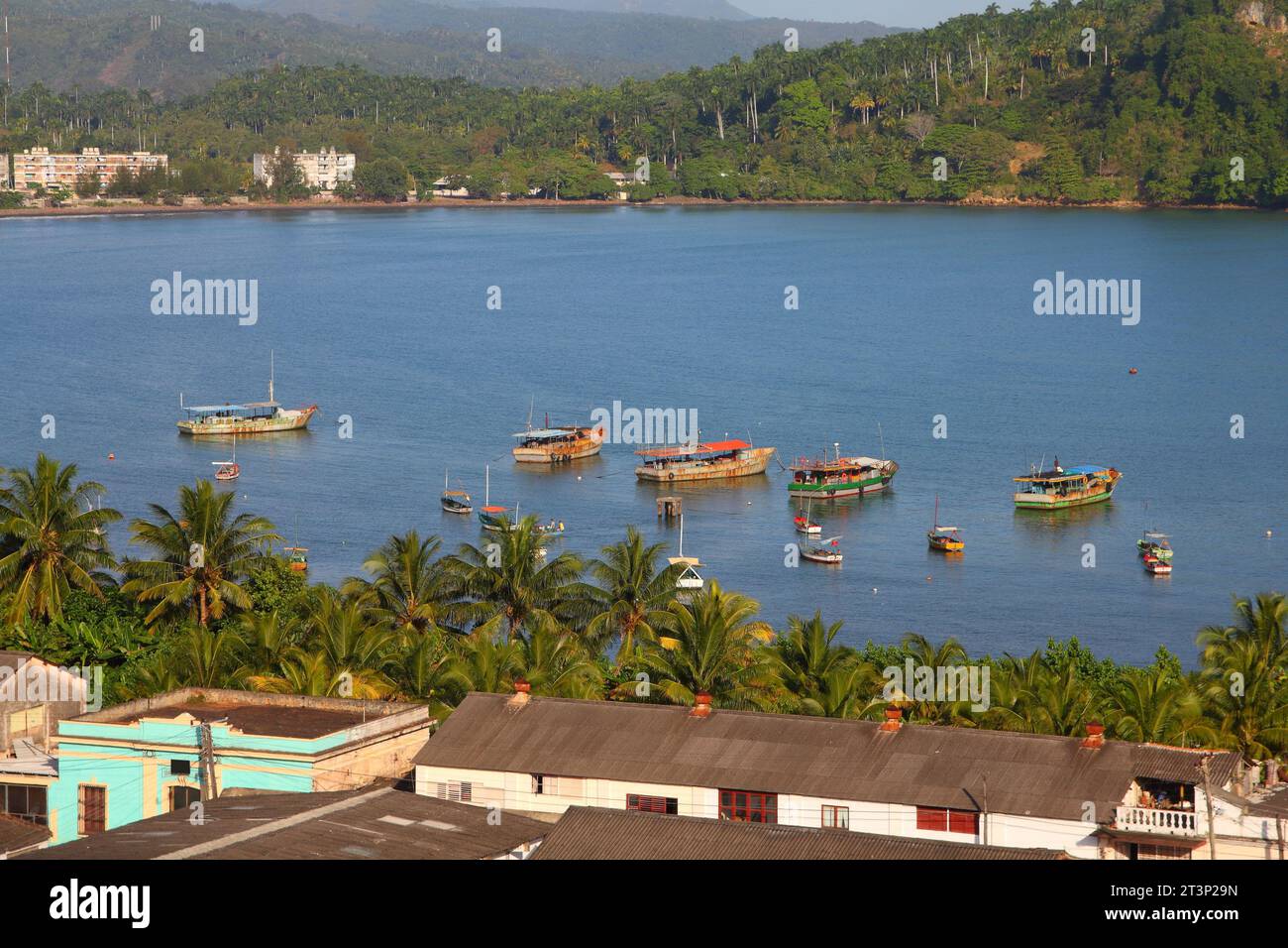 Baracoa, Cuba - travel destination landscape. Caribbean Sea bay. Ships ...