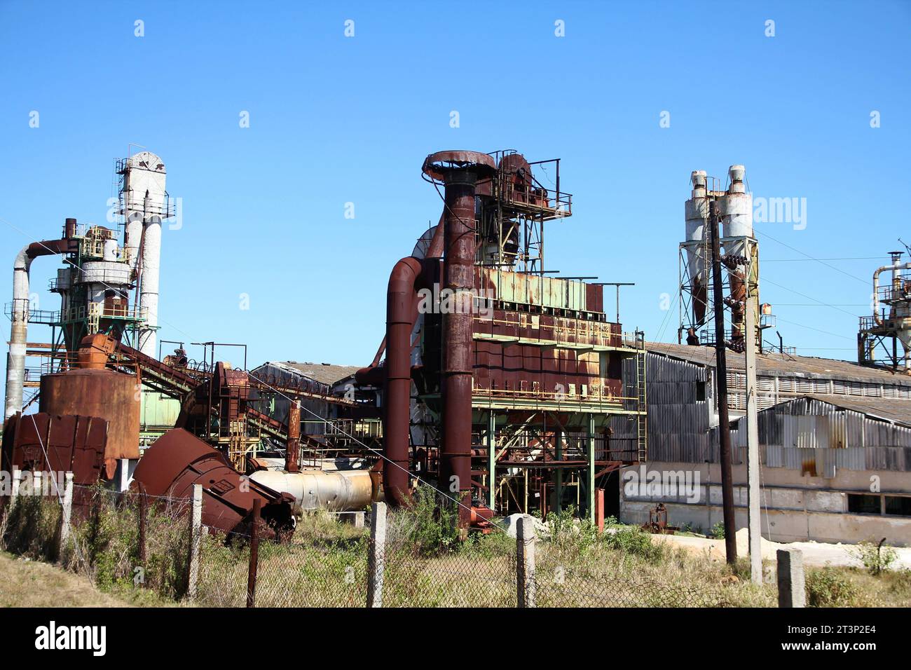 Old defunct sugar and chocolate factory in Cuba. Obsolete industrial ...