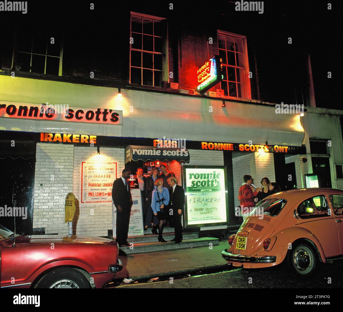 England. London. Historic Ronnie Scott's Jazz Club front door with Irakere signs. 1991 Stock ...