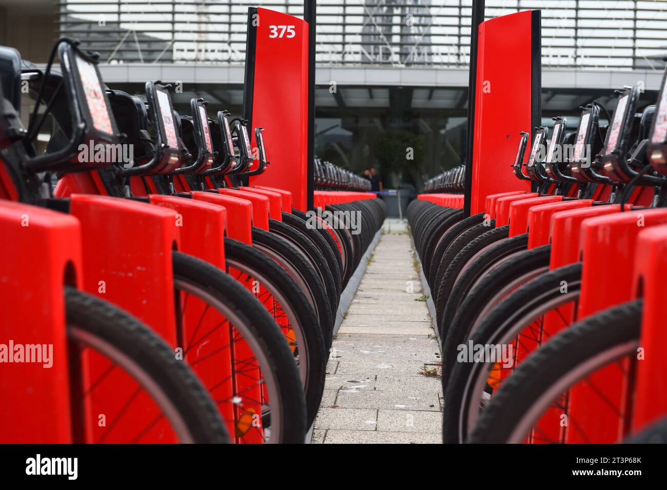 Two Rows of front wheels of Hire cycles available for rent at one of ...