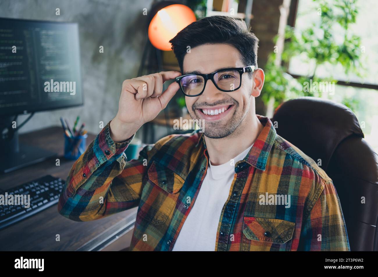 Portrait of successful front end developer hand touch glasses sitting ...