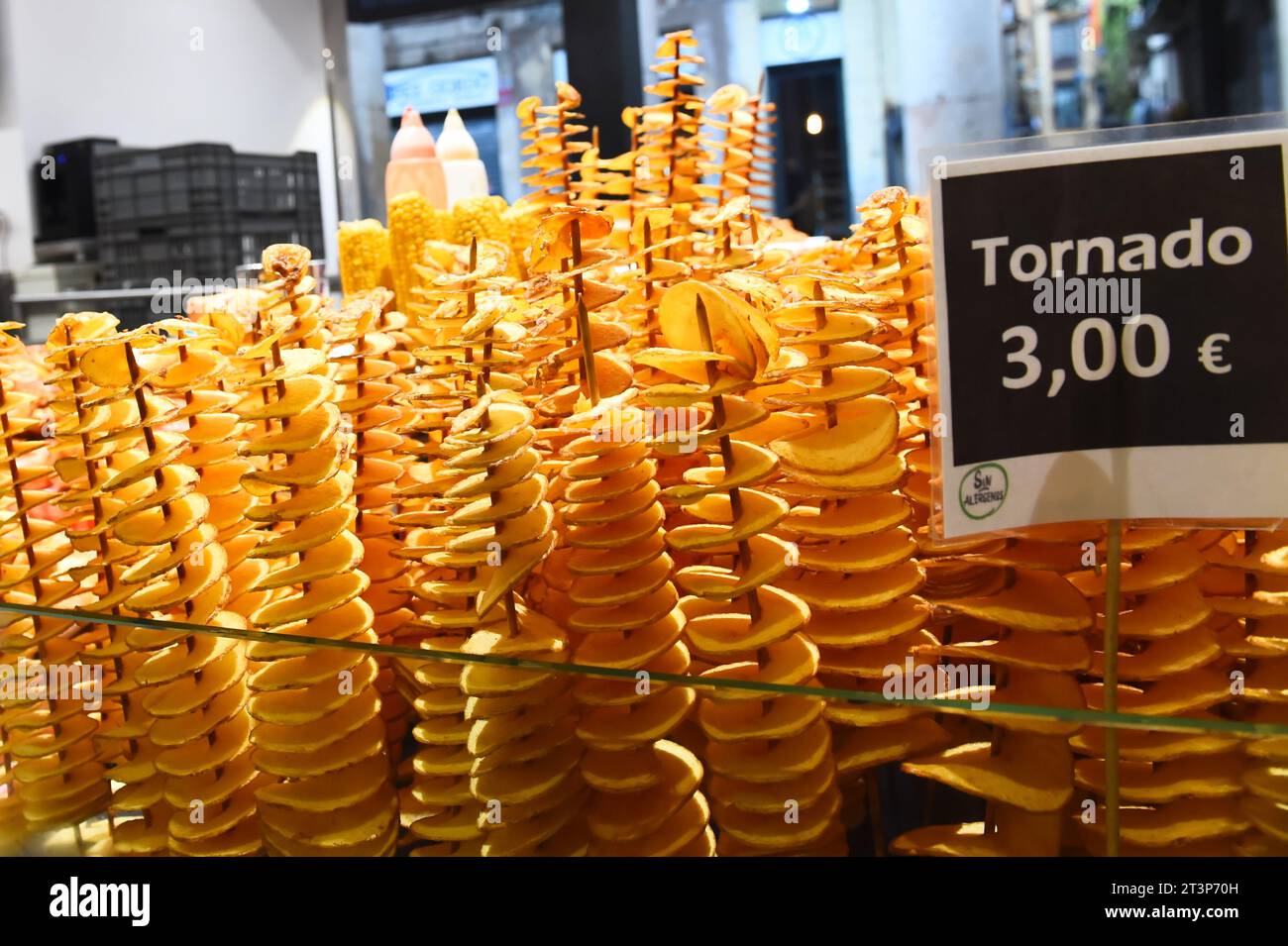 Cooked tornado- potato swirl at Barcelona indoor market Barcelona Spain ...