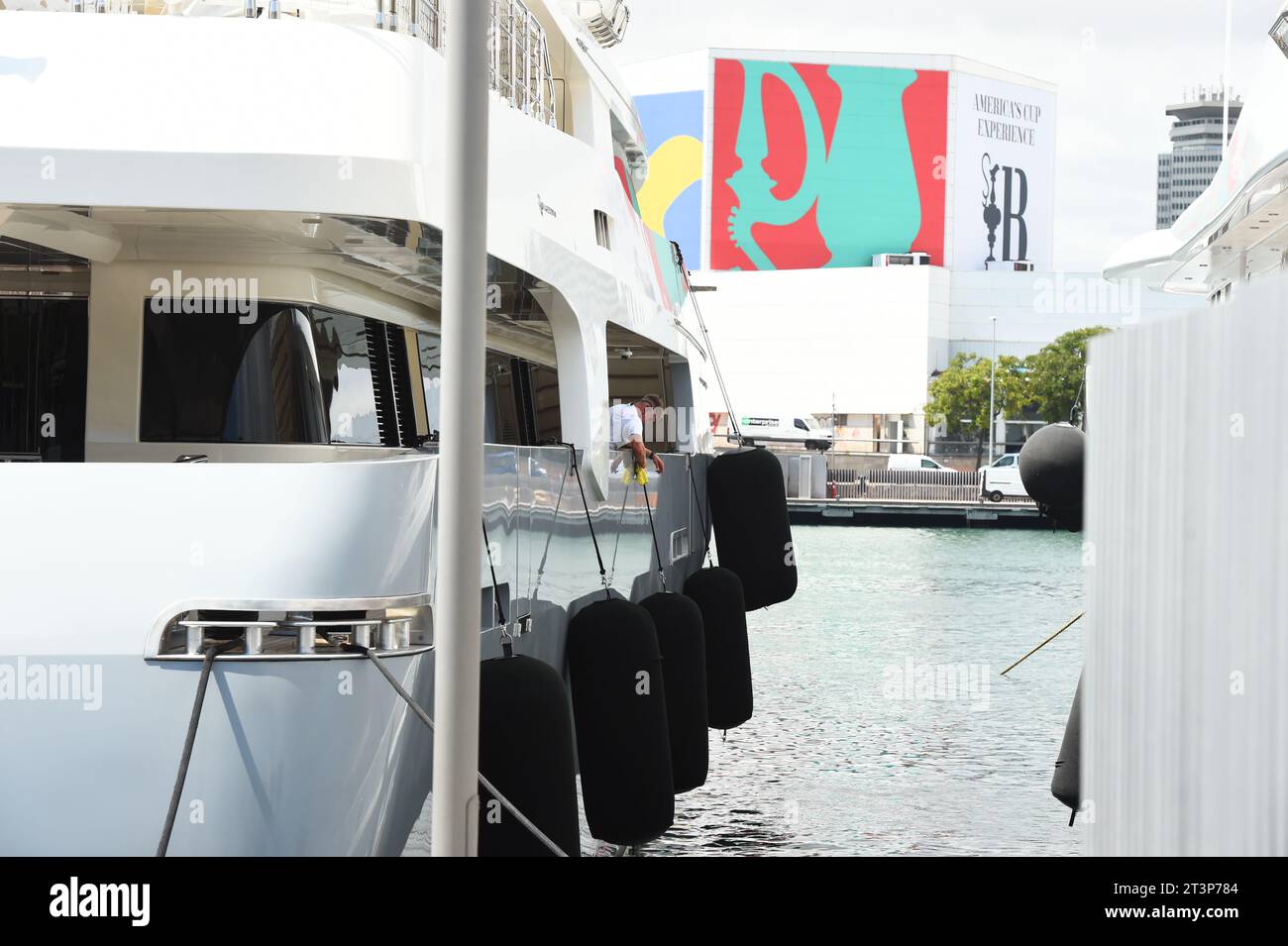 Deck crew working on super yacht in preparation for guests - Barcelona ...
