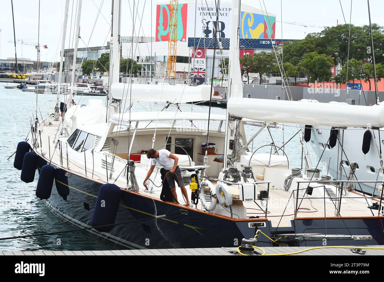 Deck crew working on super yacht in preparation for guests - Barcelona ...