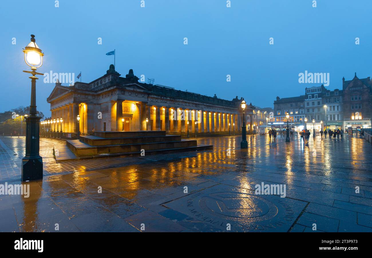 Evening view of floodlit Royal Scottish Academy art museum in the rain ...