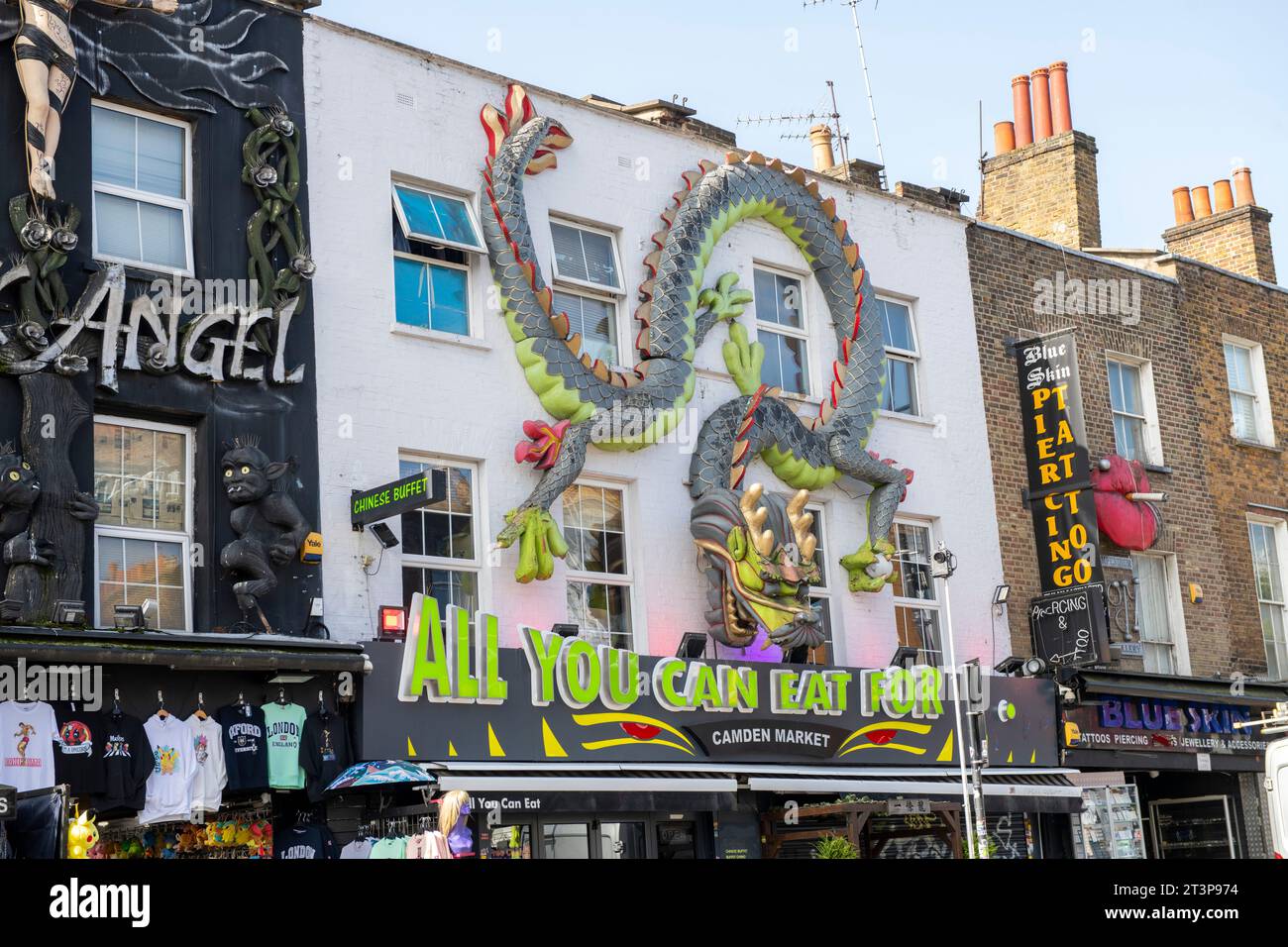 Colourful shops and buildings on the High Street in Camden Town, London ...