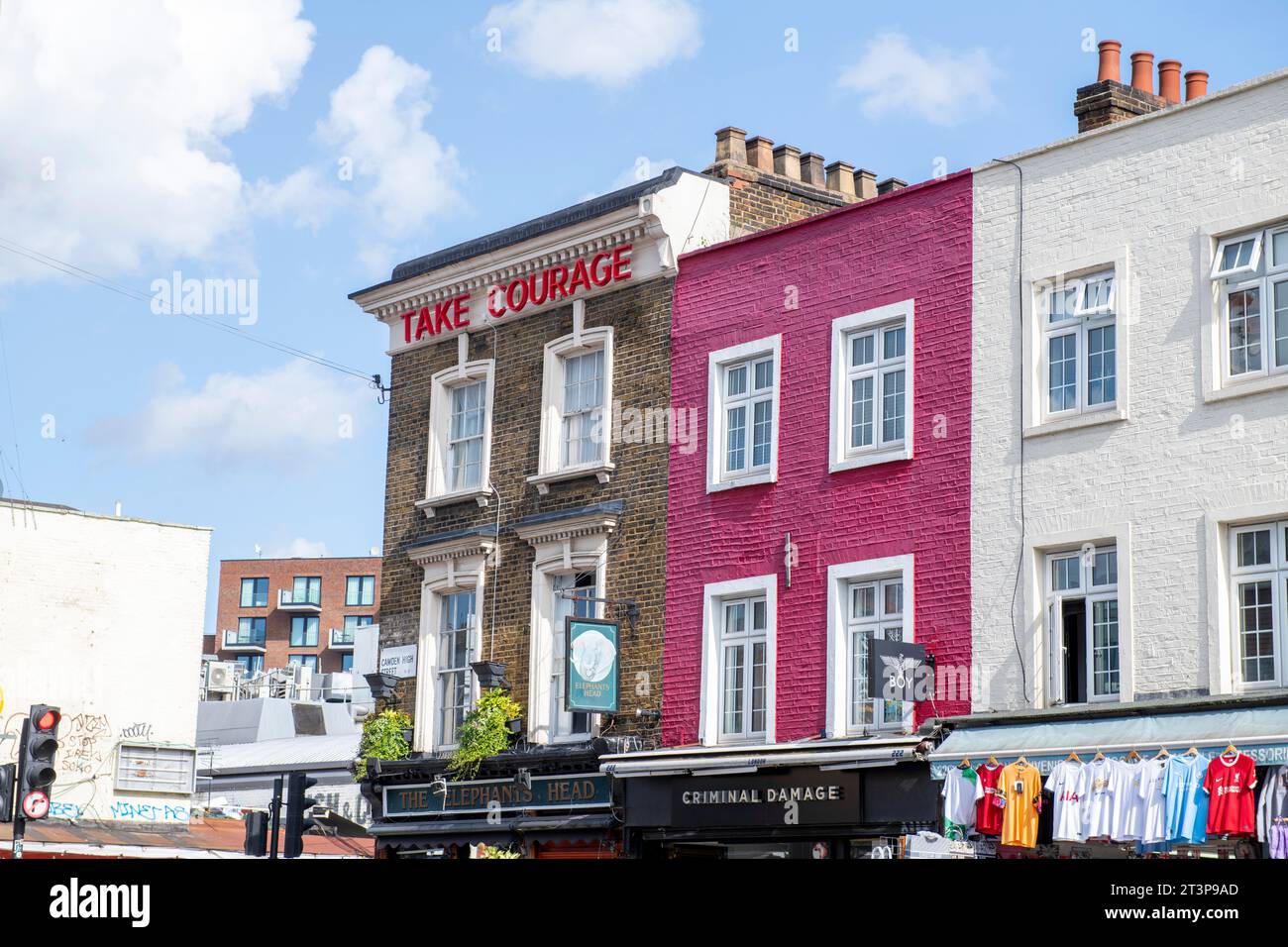 Colourful shops and buildings on the High Street in Camden Town, London ...