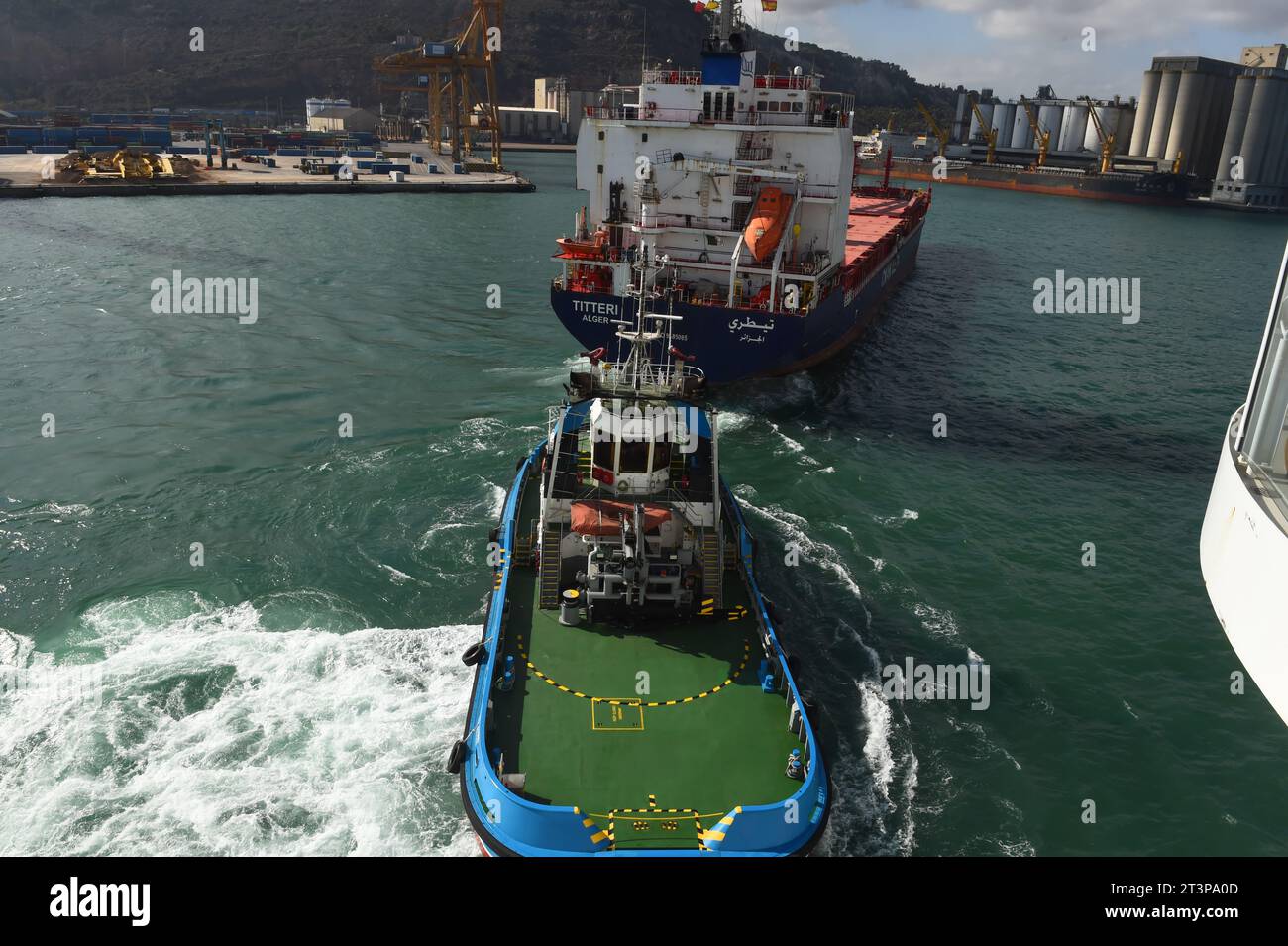 Tug boat in operation Barcelona harbour - Barcelona Spain 31 July 2023 ...