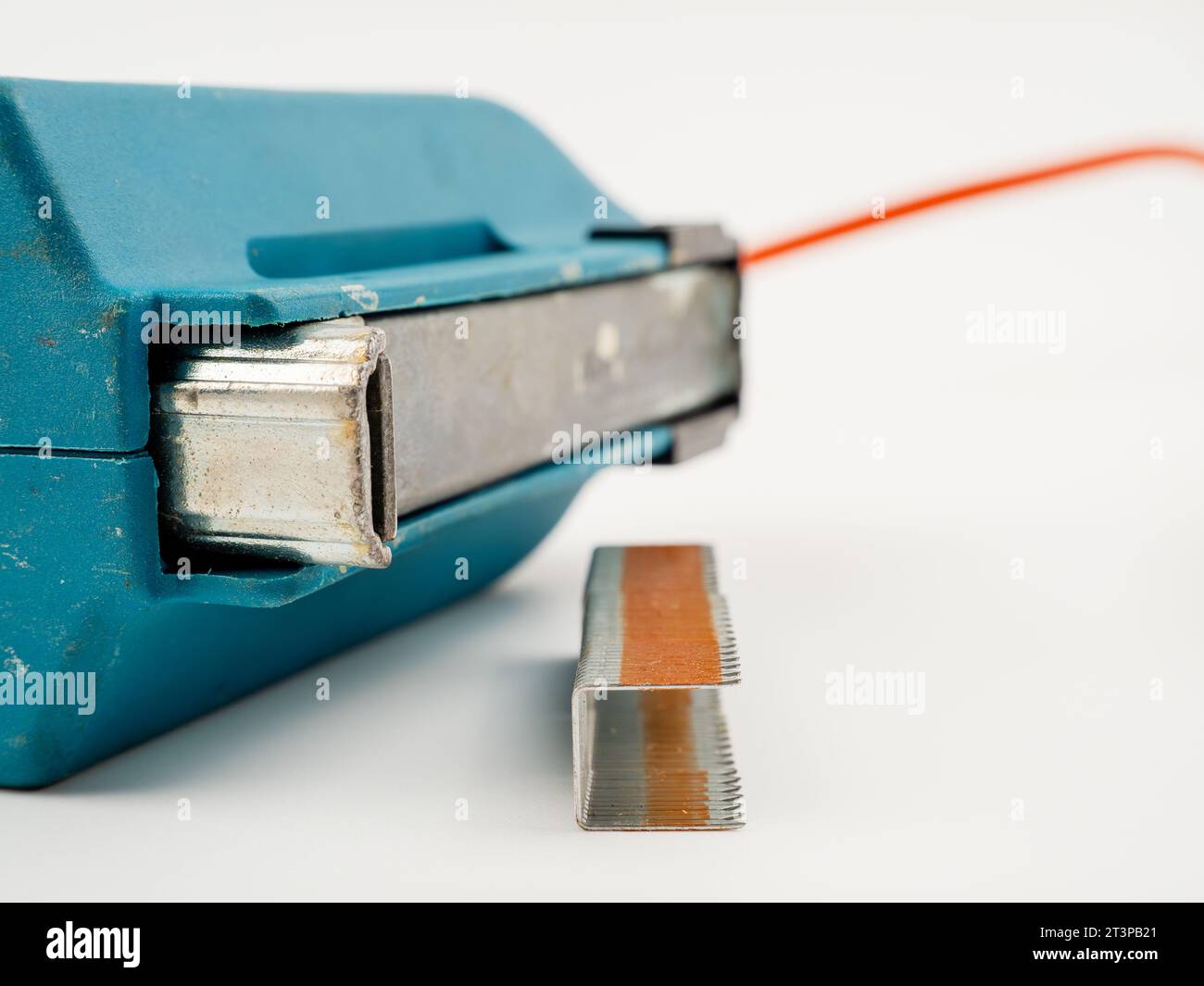 Electric stapler on a white background. Electric staple gun close-up ...