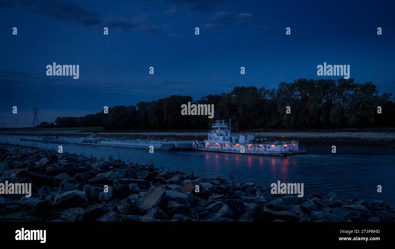 towboat with barges on Chain of Rock Bypass Canal of Mississippi River ...