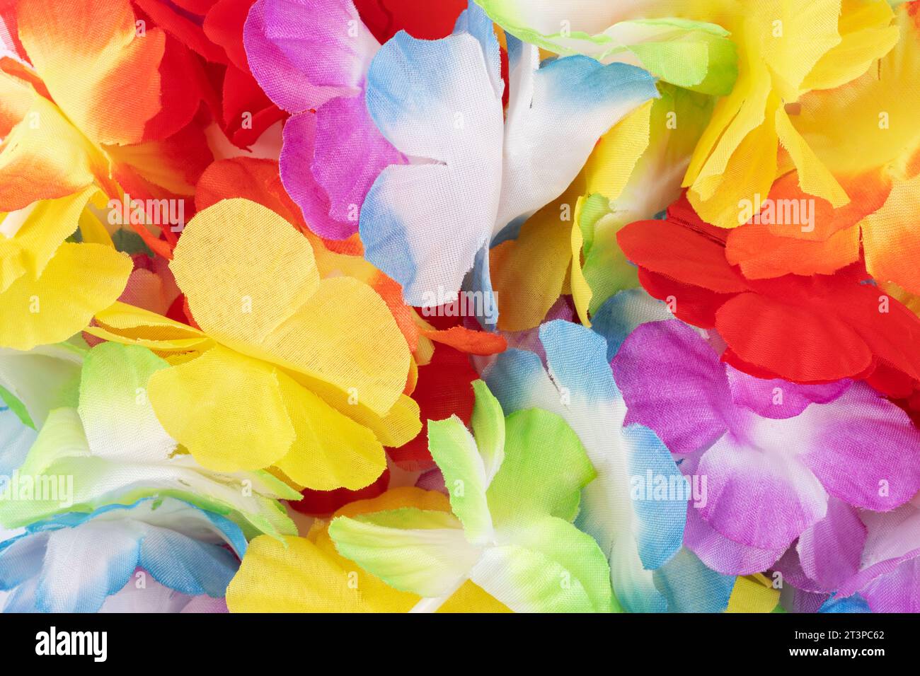 Close-up multi colored textile flowers background Stock Photo - Alamy