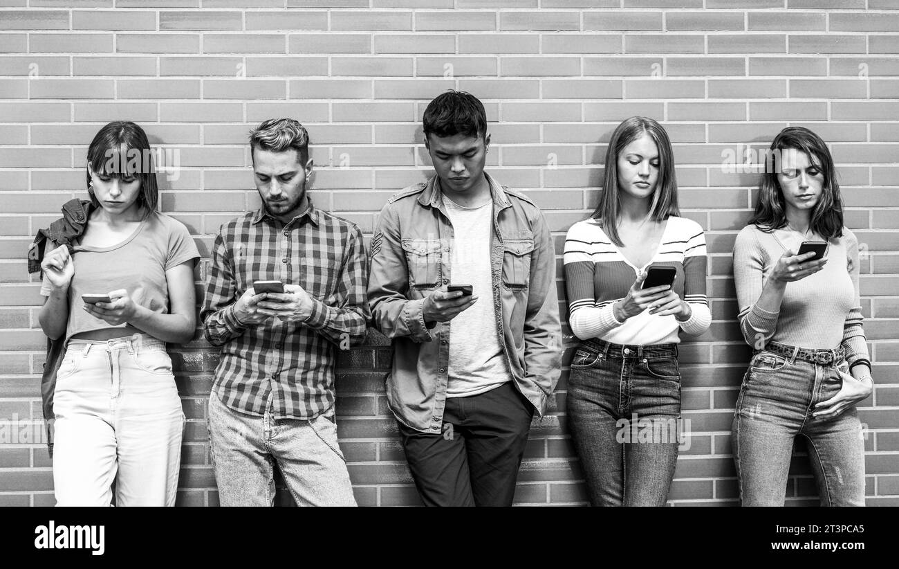 Millennial people using mobile Black and White Stock Photos & Images ...