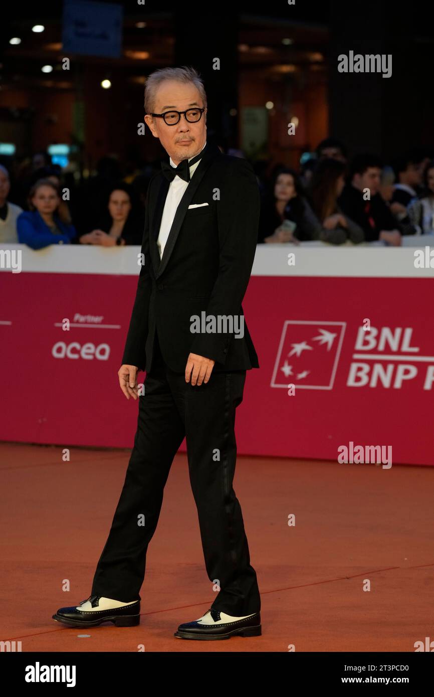 Actor Lily Franky poses on the red carpet for the film Cottontail at ...