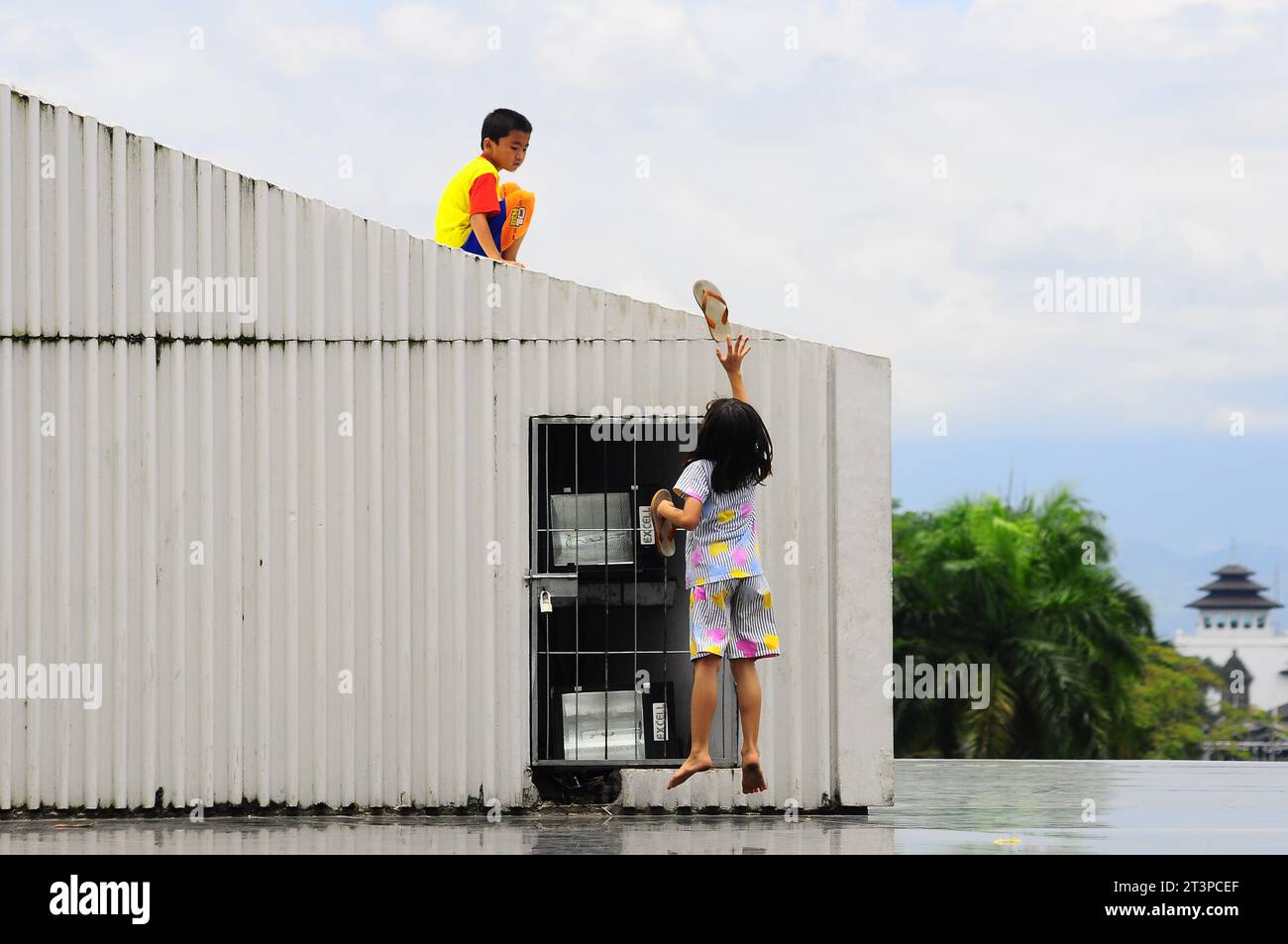 Two children play at the West Java People's Struggle Monument (Monumen ...