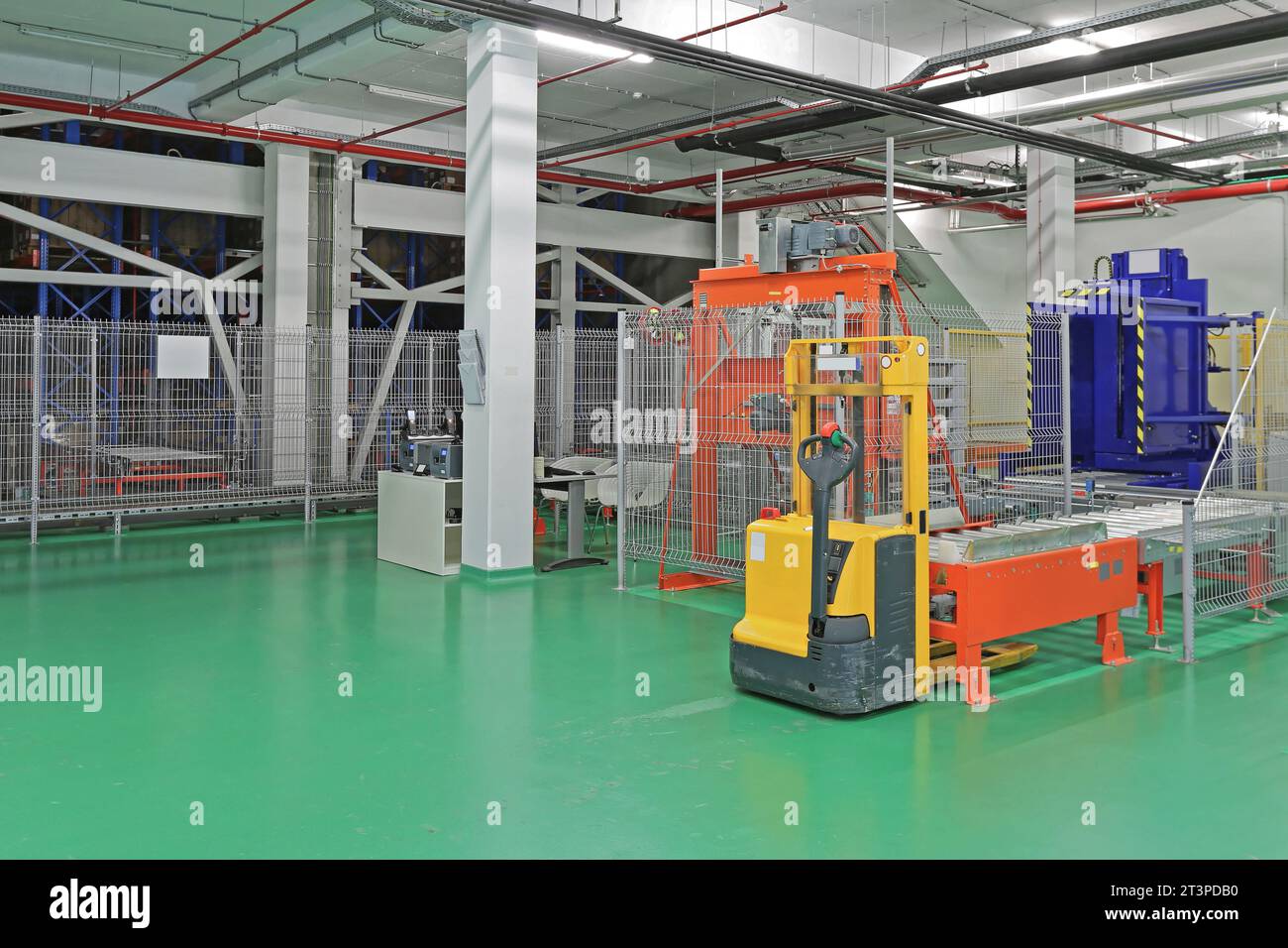 Pallet Truck Forklift at Conveyor in Distribution Warehouse Production ...