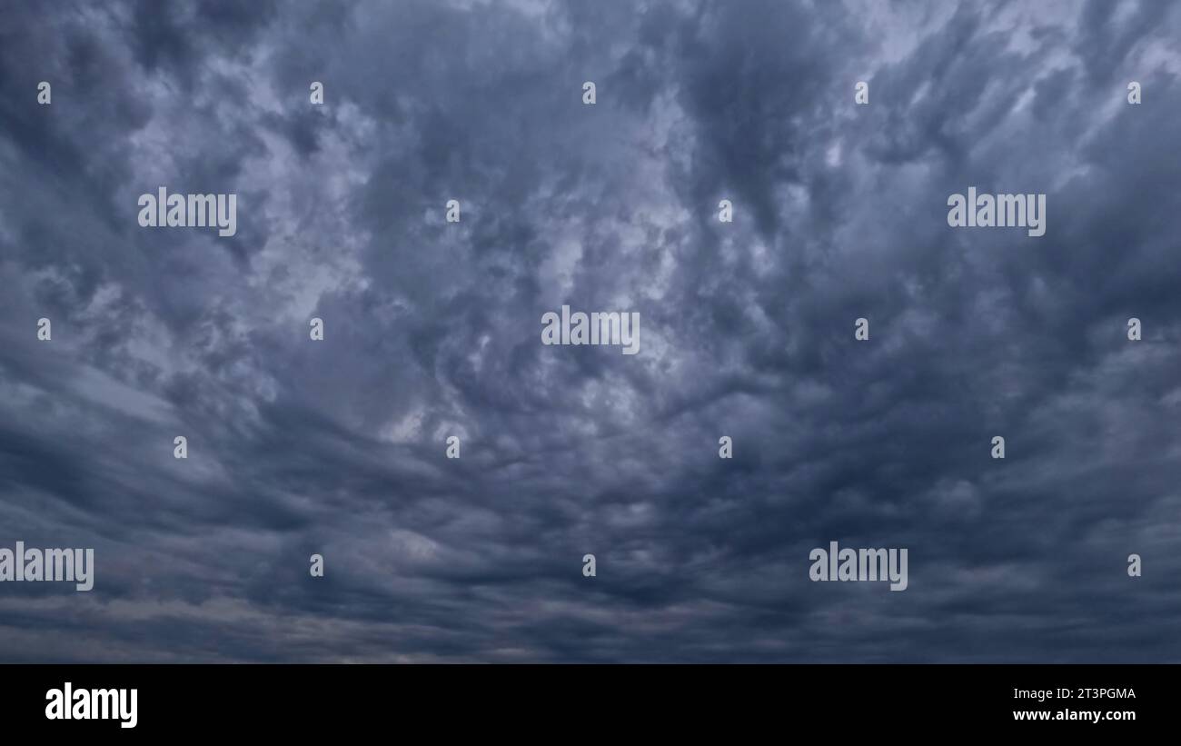 nice cloudscape of sky with heavy rain or snow clouds background ...