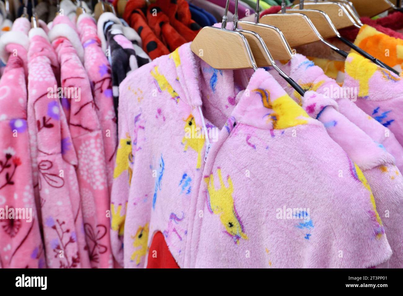 Furry women's dressing gown in store Stock Photo - Alamy
