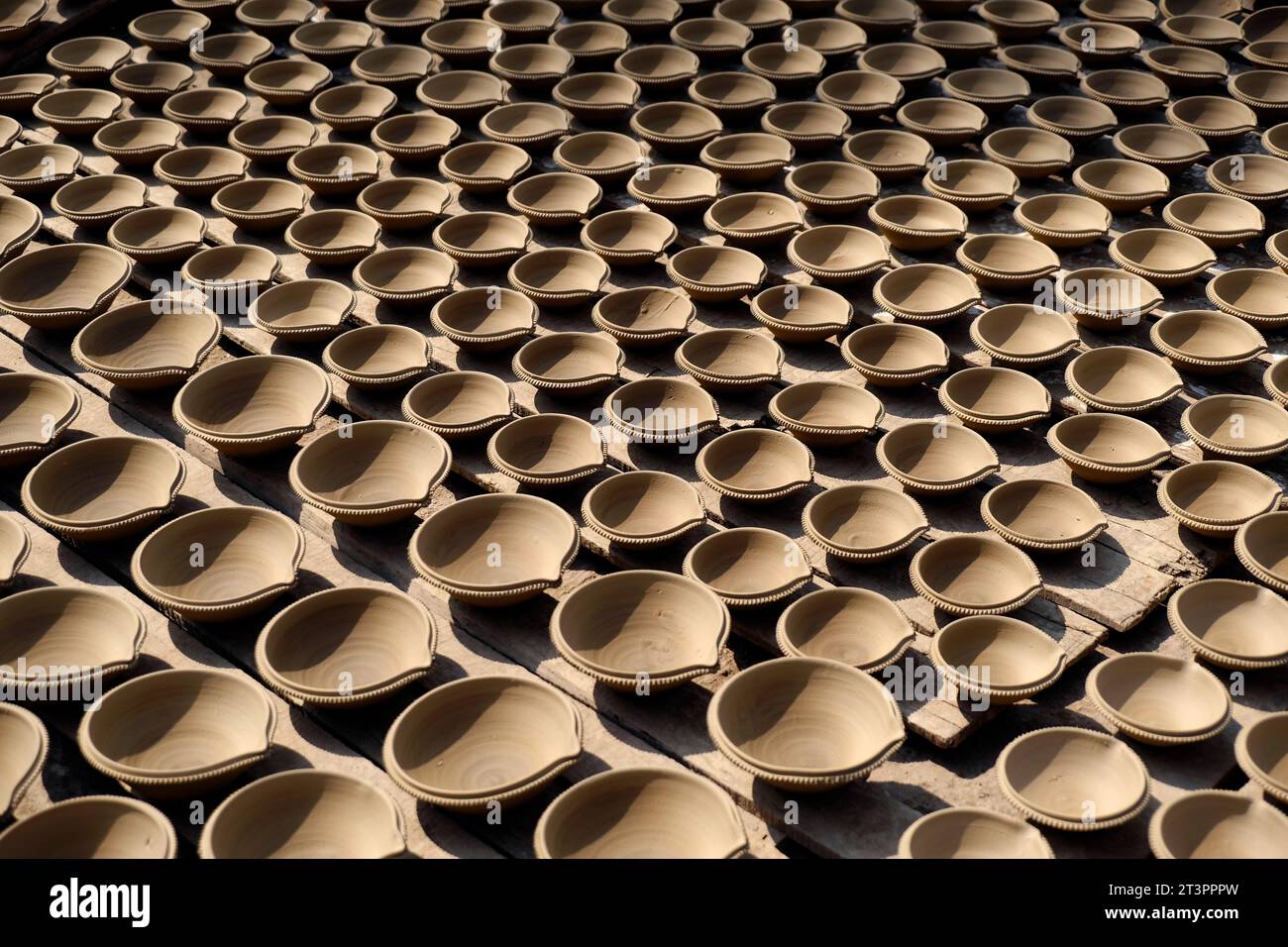 26 October 2023, Pune, India, Indian potter making Diya (oil lamps) or ...