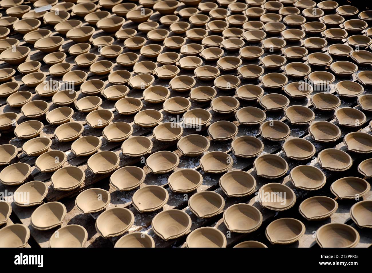26 October 2023, Pune, India, Indian potter making Diya (oil lamps) or ...