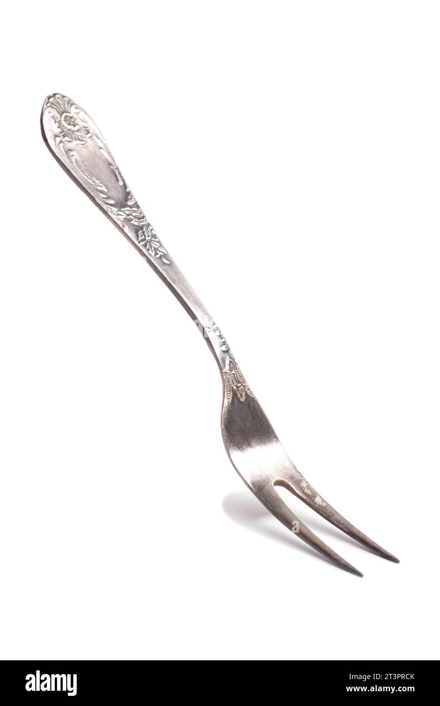 Old Silver Serving Fork isolated on white background Stock Photo - Alamy