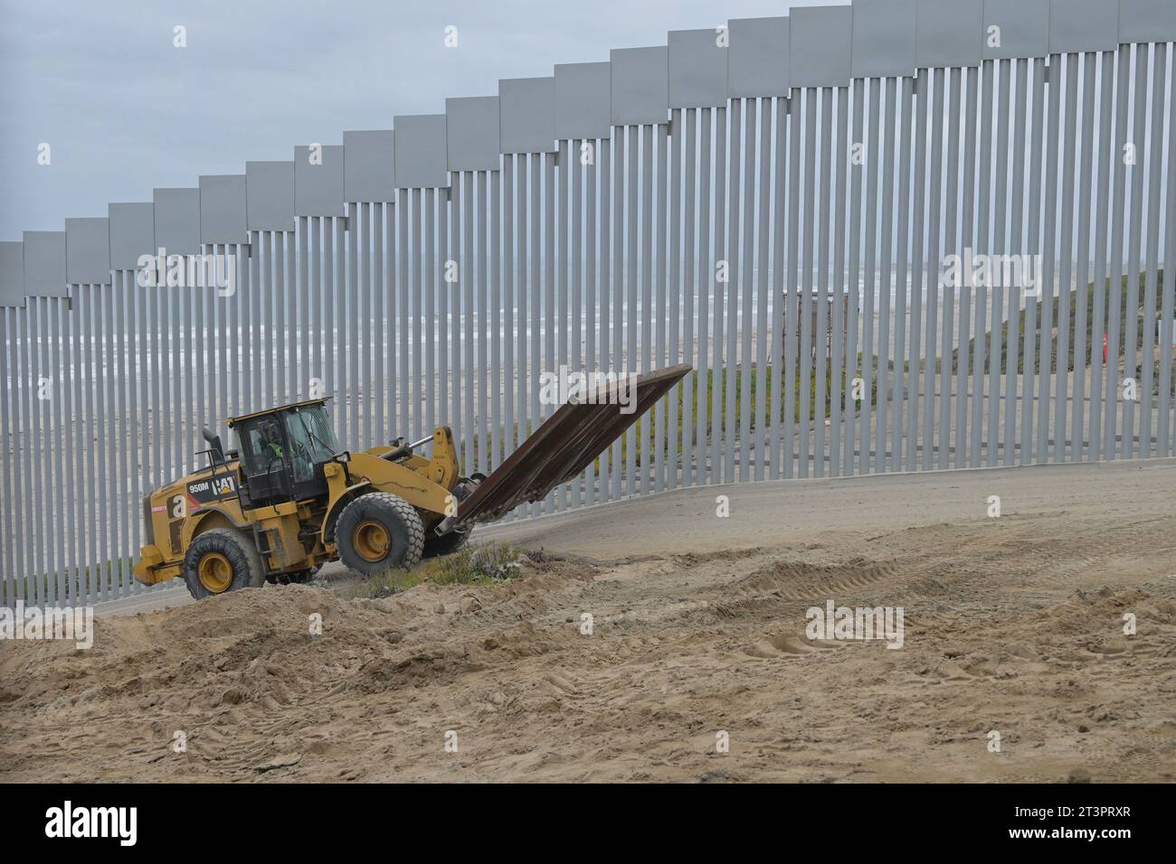 Tijuana, Baja California, Mexico. 25th Oct, 2023. Thirty foot fence ...