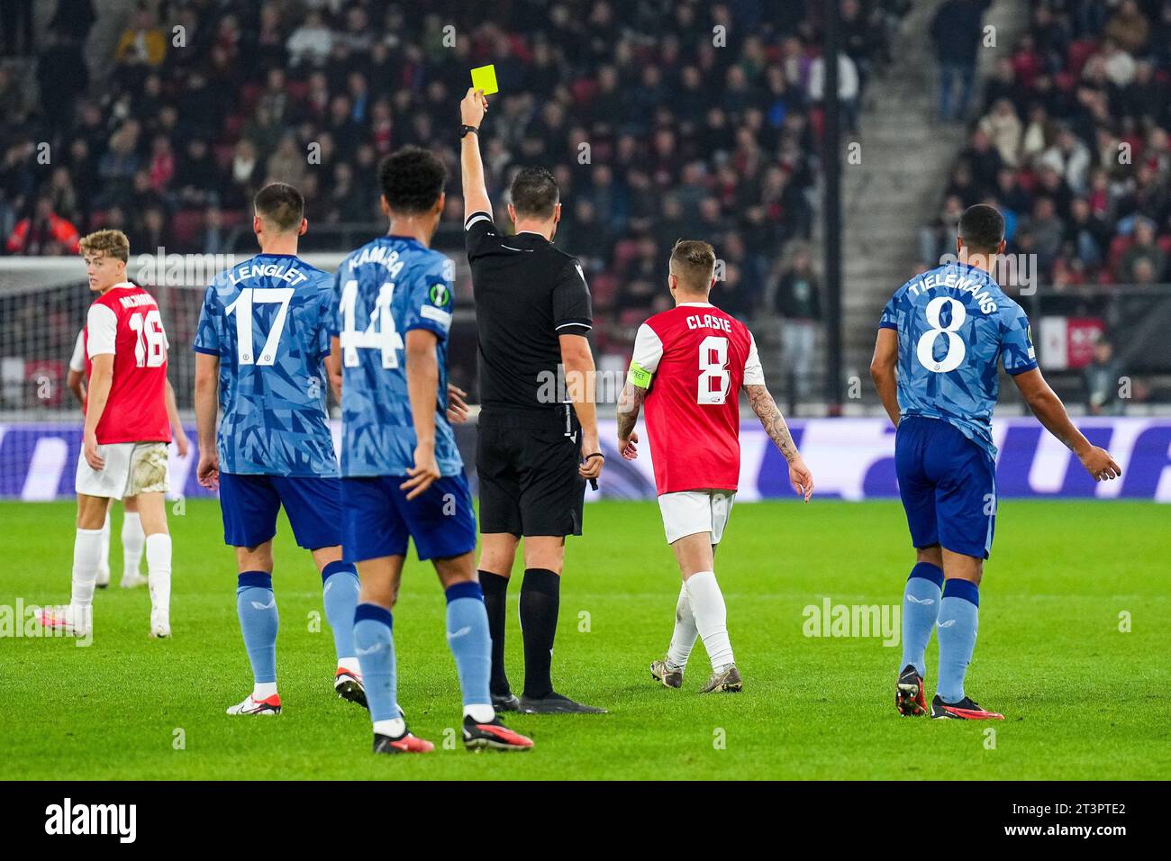 ALKMAAR - (l-r) Referee Sven Jablonski shows Jordy Clasie of AZ Alkmaar a yellow card during the ...