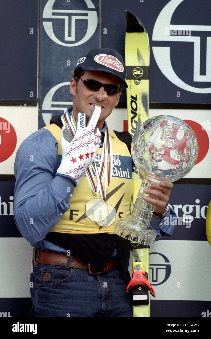 Italy Bormio 1995-03-18: Alberto Tomba, Italian skier, lifts the ...