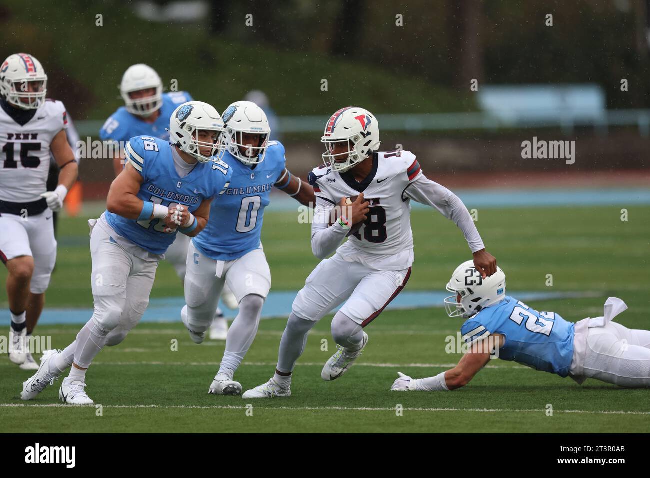 Penn Quakers wide receiver Jared Richardson #18 eludes defender during ...