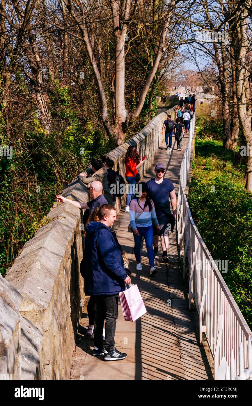 People walking along the wall. York, since Roman times, has been ...