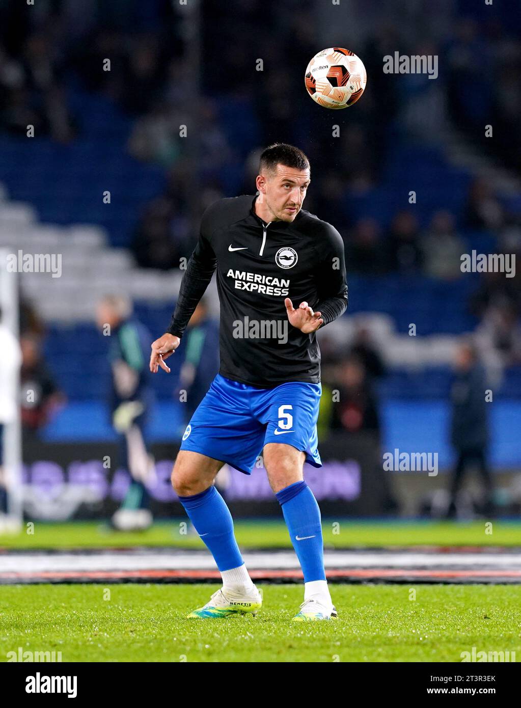Brighton and Hove Albion's Lewis Dunk warms up ahead of the UEFA Europa ...