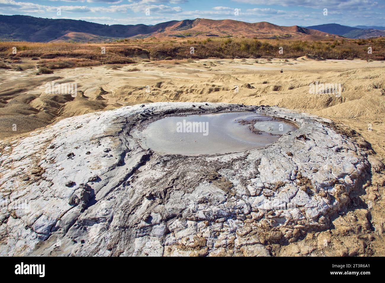 cones of mud volcanoes from which rivers of mud flow Stock Photo - Alamy
