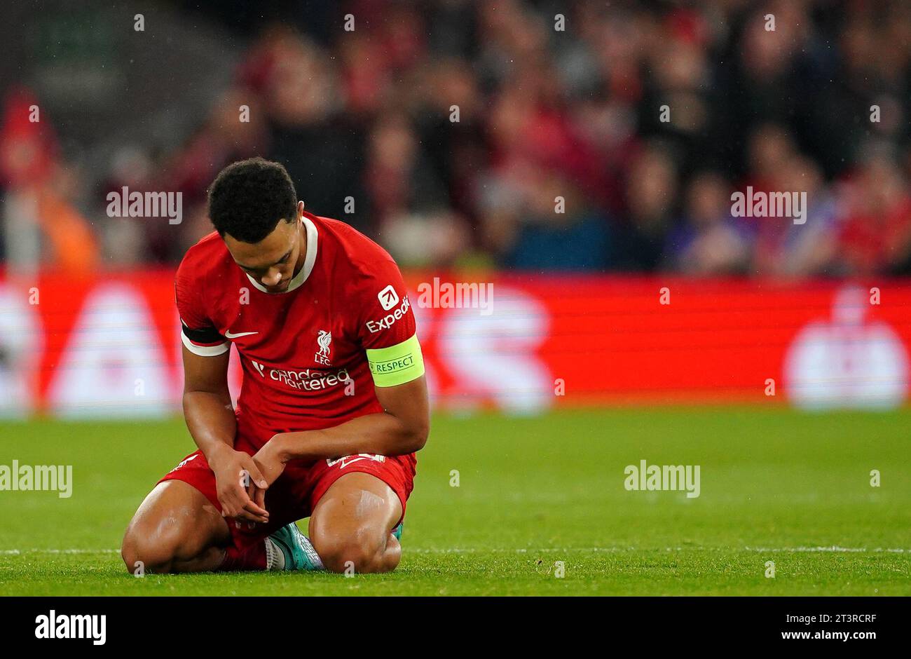 Liverpool's Trent Alexander-Arnold picks himself up after a challenge ...