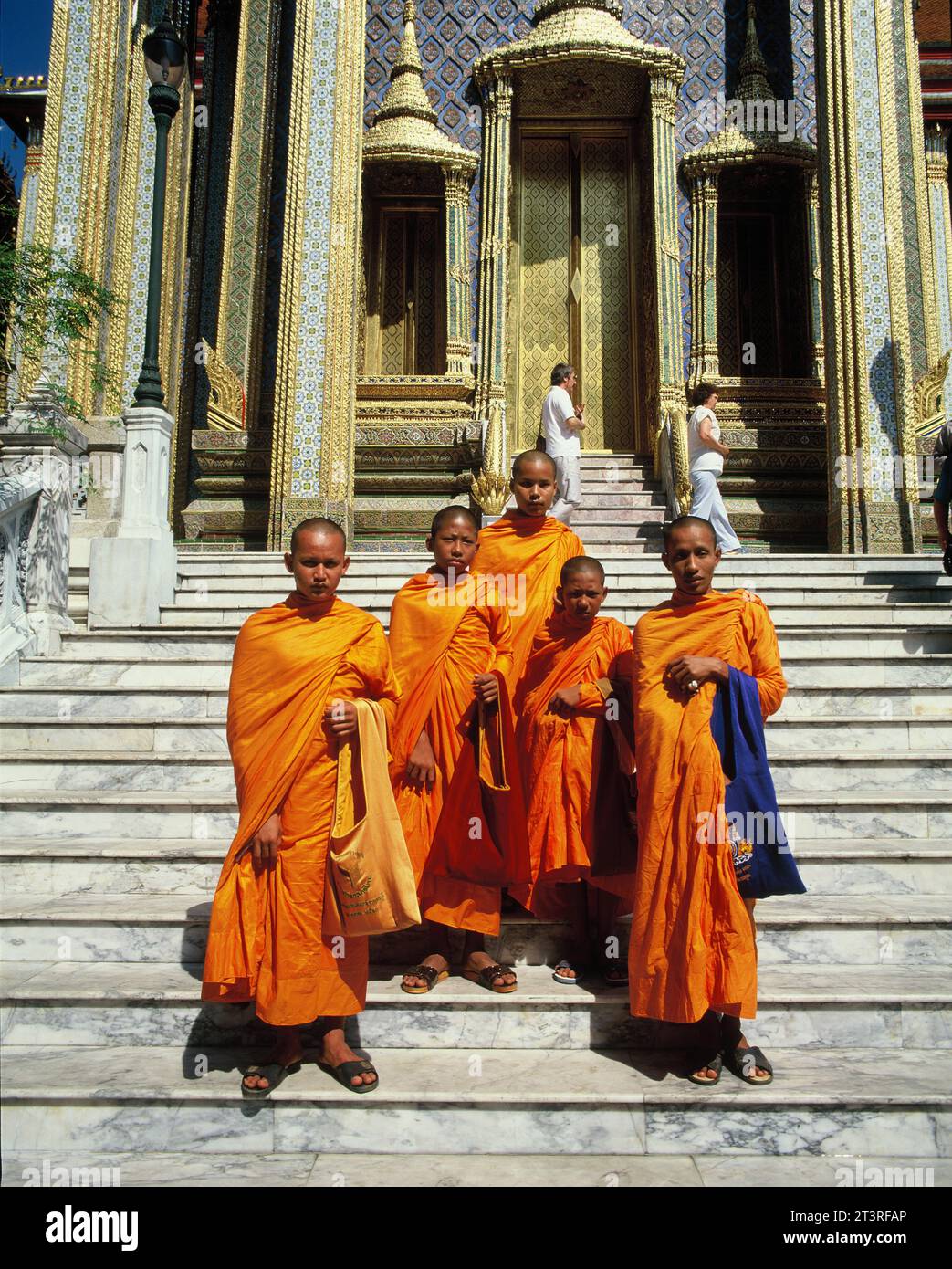 Thailand. Bangkok. Wat Phra Kaew. Buddhist monks standing on temple ...