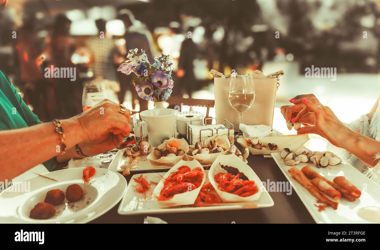 Women party buffet hi-res stock photography and images - Alamy