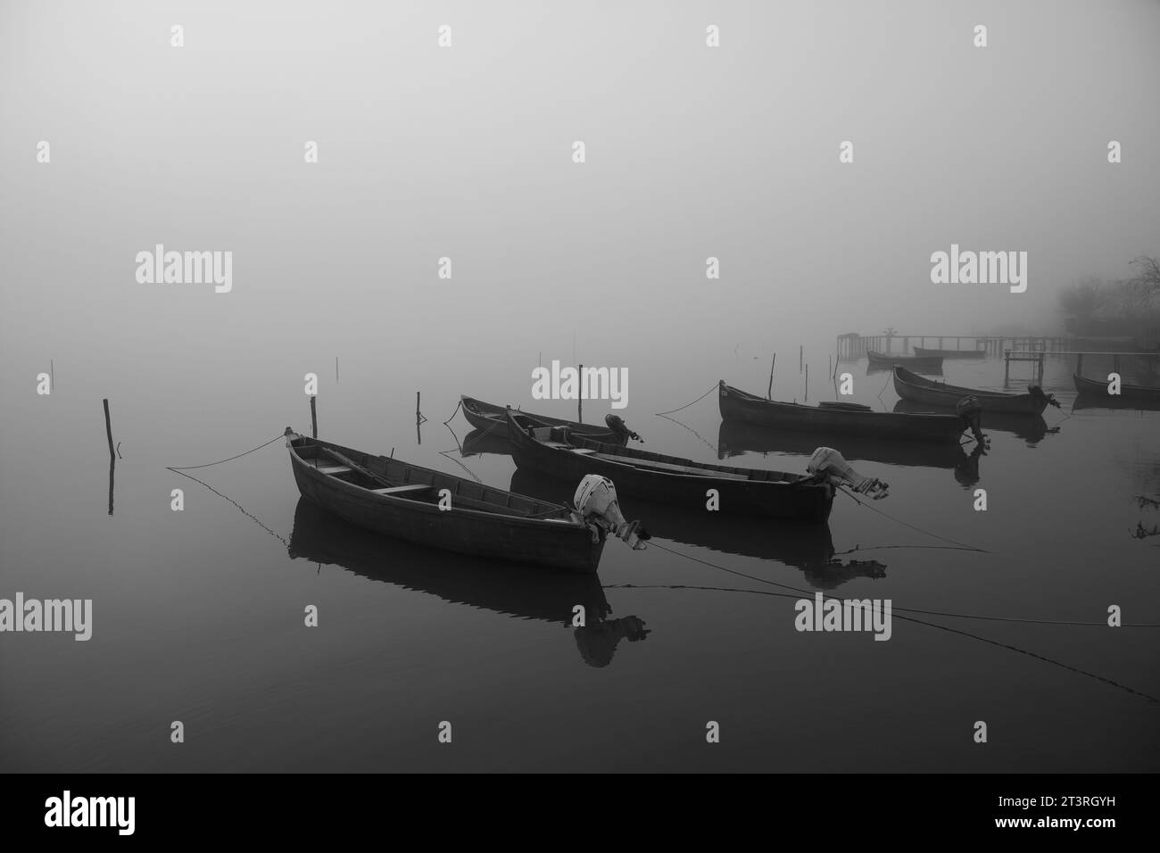 Angler on boat fishing Black and White Stock Photos & Images - Alamy