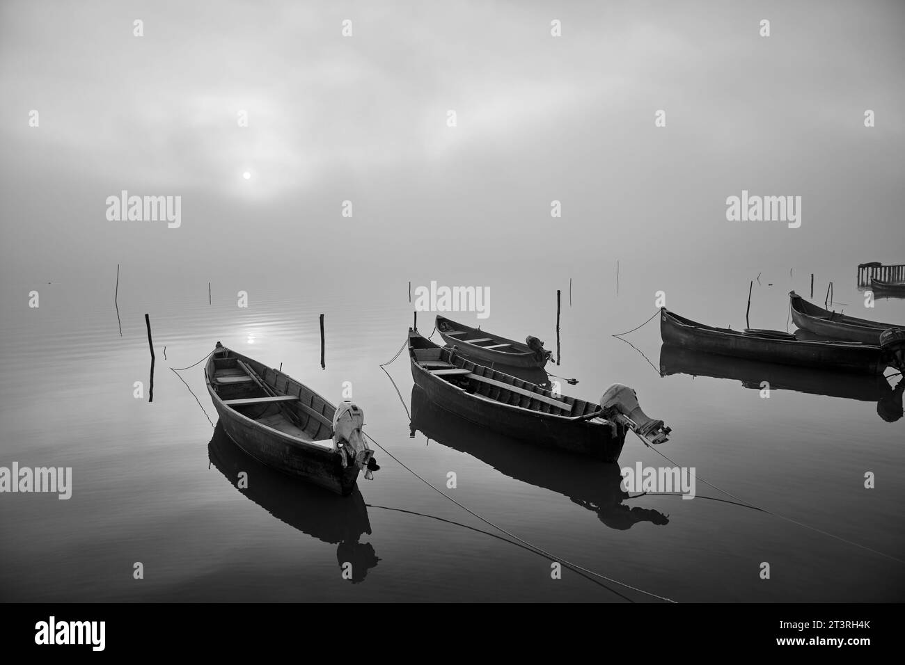 Angler on boat fishing Black and White Stock Photos & Images - Alamy