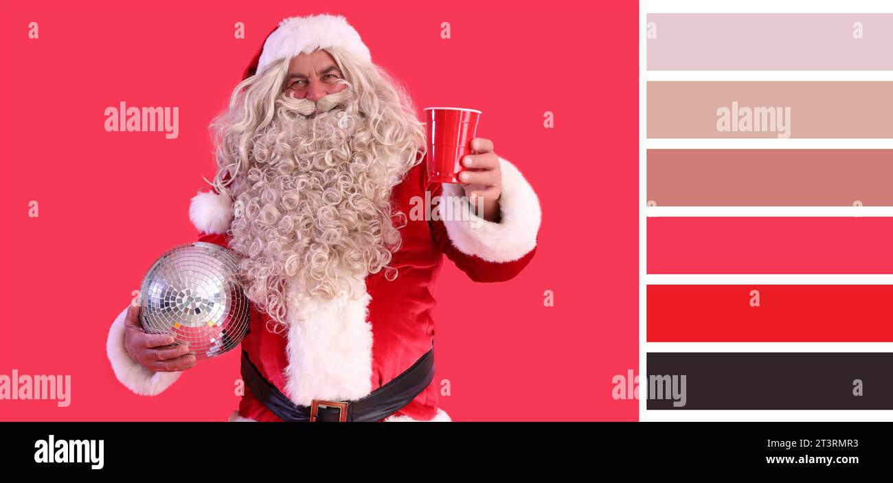Santa Claus with disco ball and drink on red background. Different ...